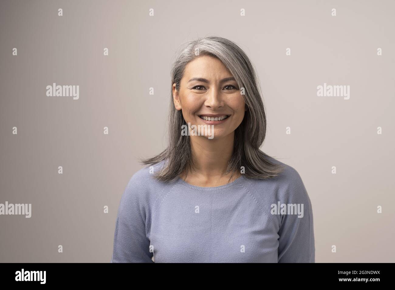 Beautiful asian lady grey hi-res stock photography and images - Alamy