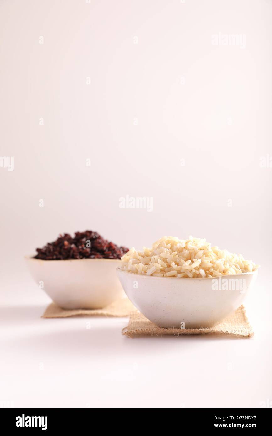 Organic boiled brown rice on bowl isolated in white background Stock ...