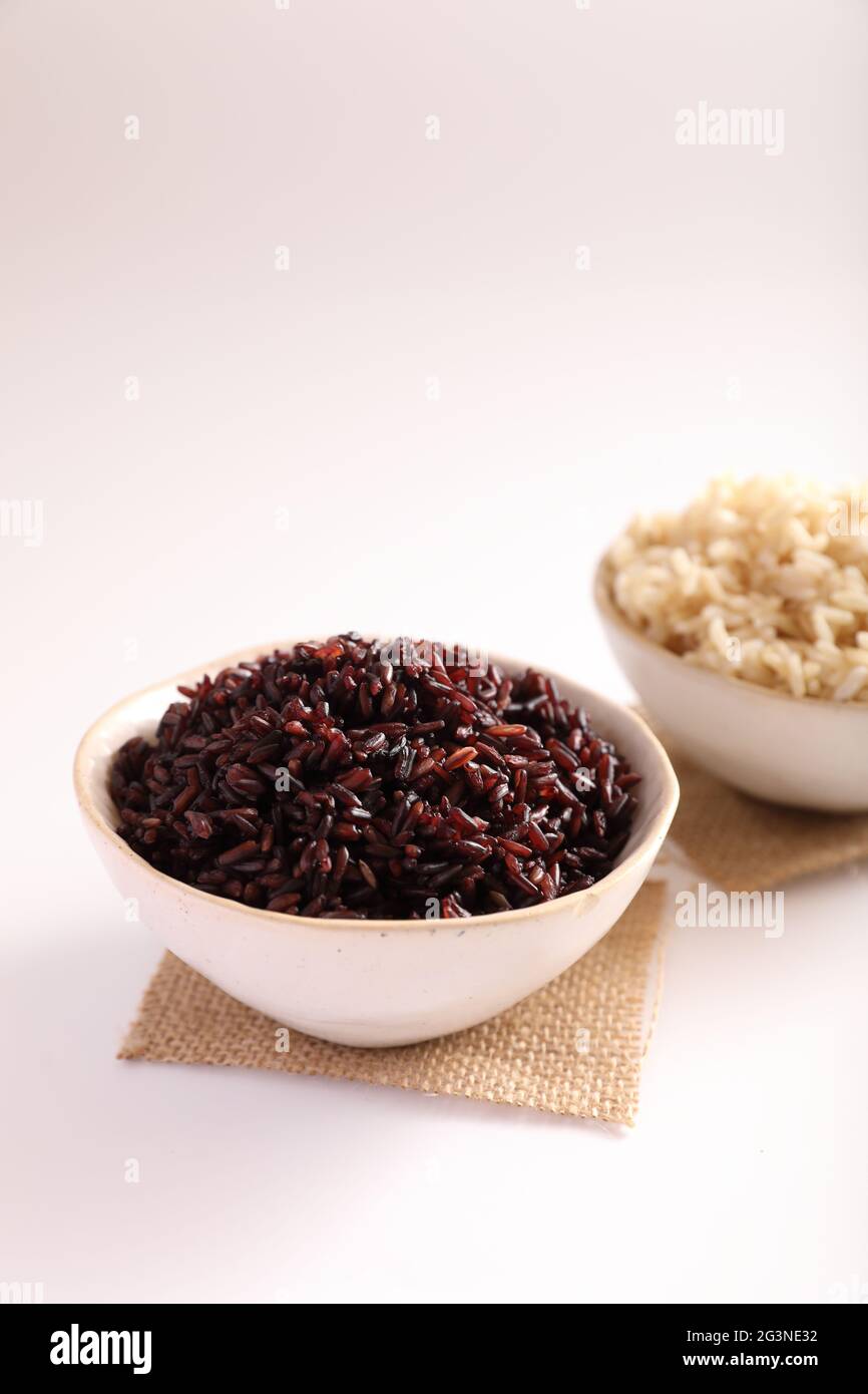 Organic boiled brown rice on bowl isolated in white background Stock ...
