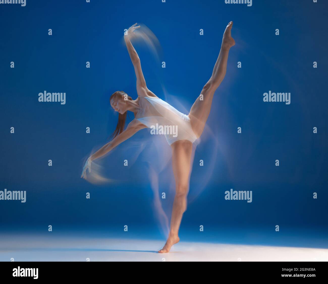 Graceful young beautiful girl, female ballet dancer dancing isolated ...