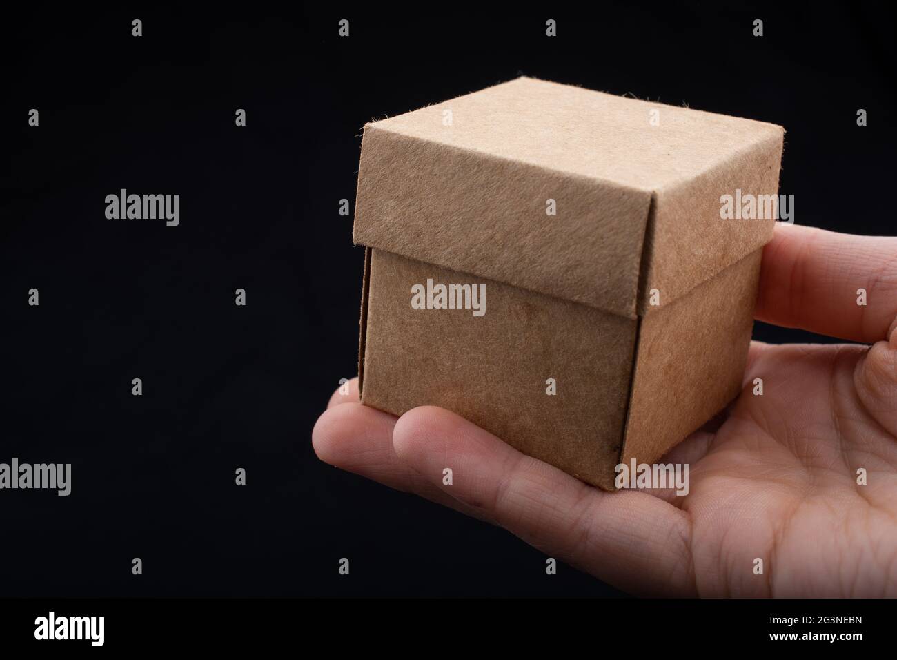 Hand holding box hi-res stock photography and images - Alamy
