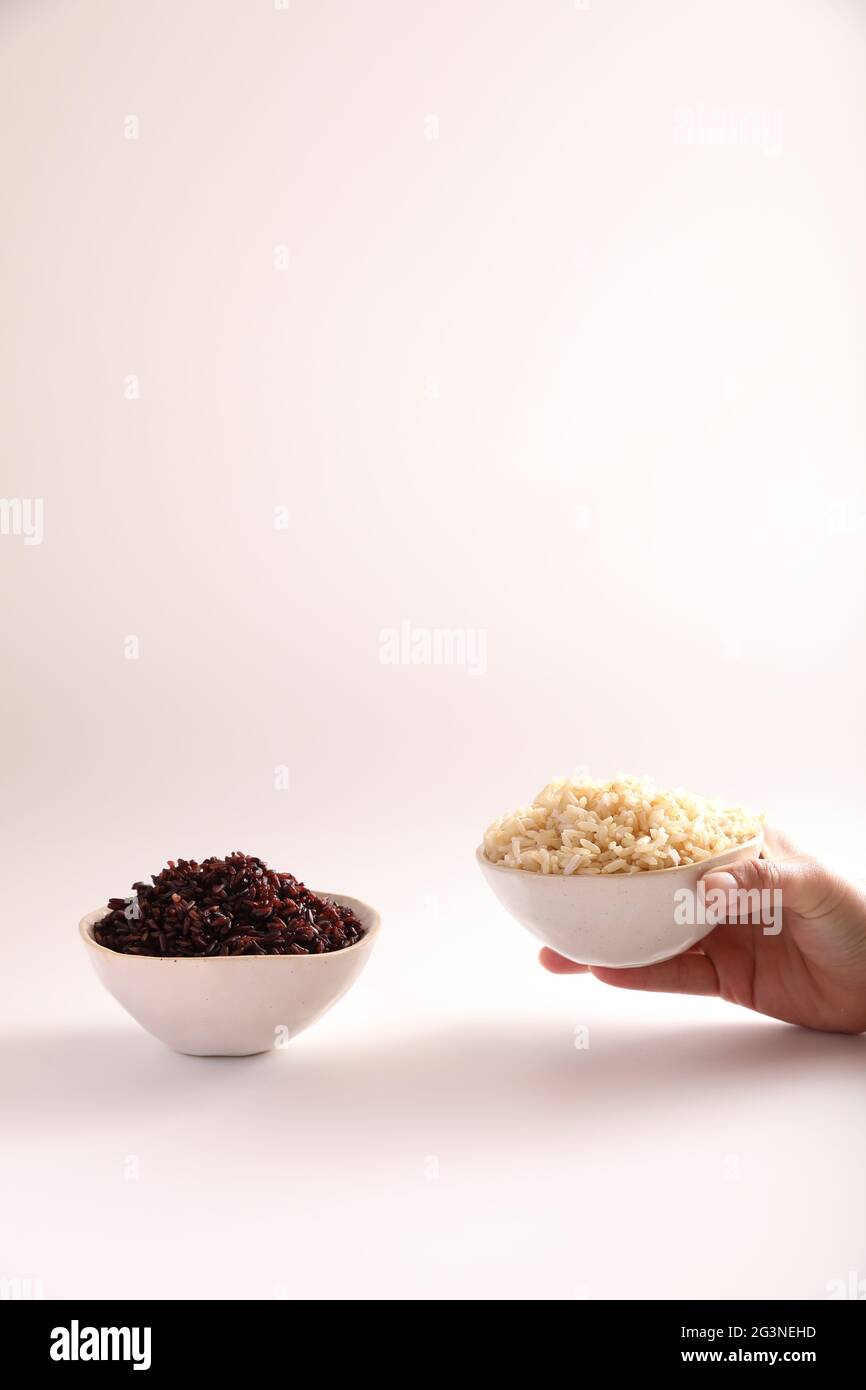 Organic boiled brown rice on bowl isolated in white background Stock ...
