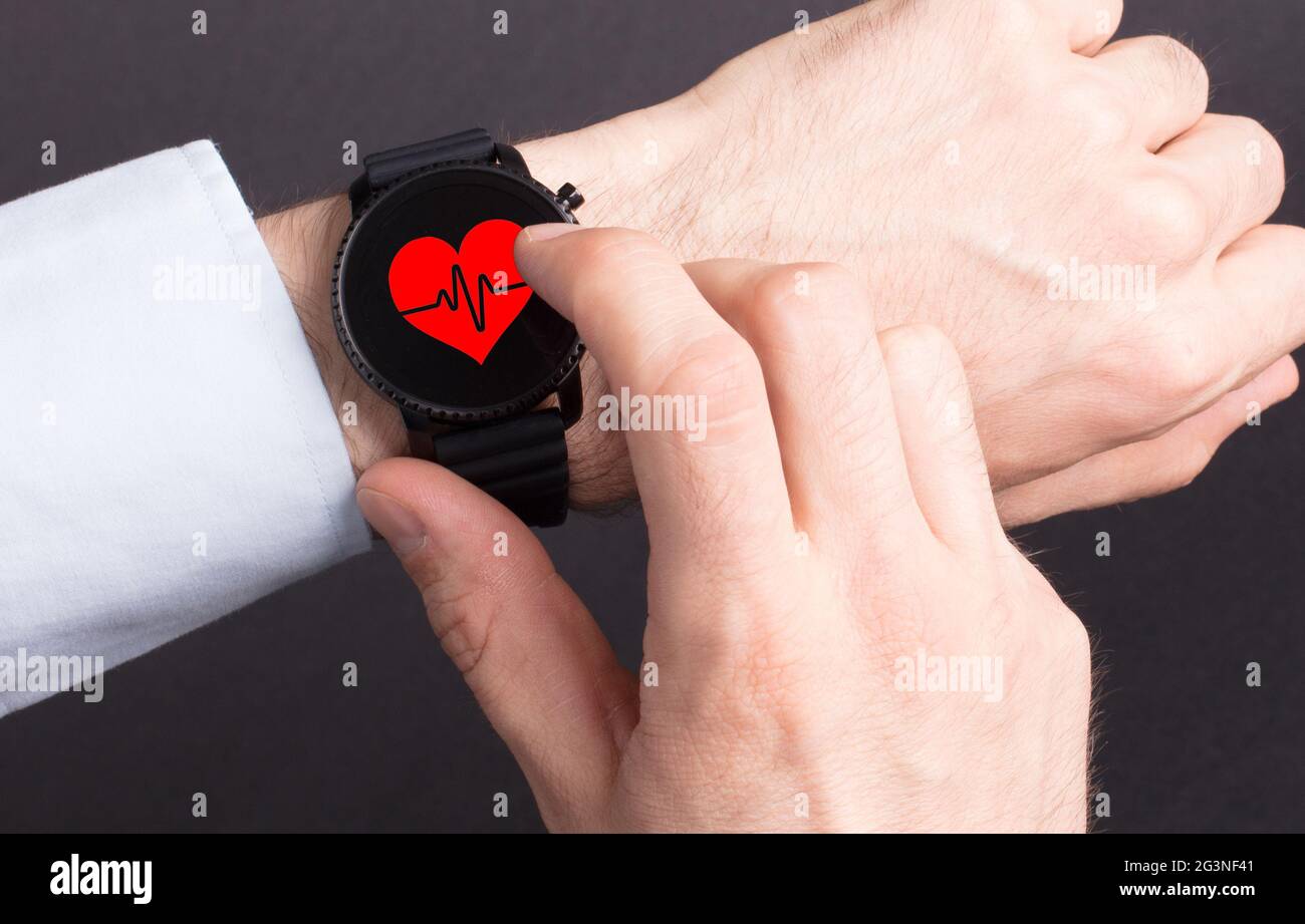 Black smartwatch isolated, heartbeat Stock Photo - Alamy