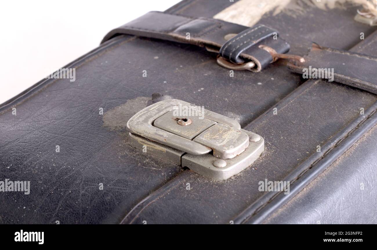 Old vintage hard suitcase with latch lock Stock Photo - Alamy
