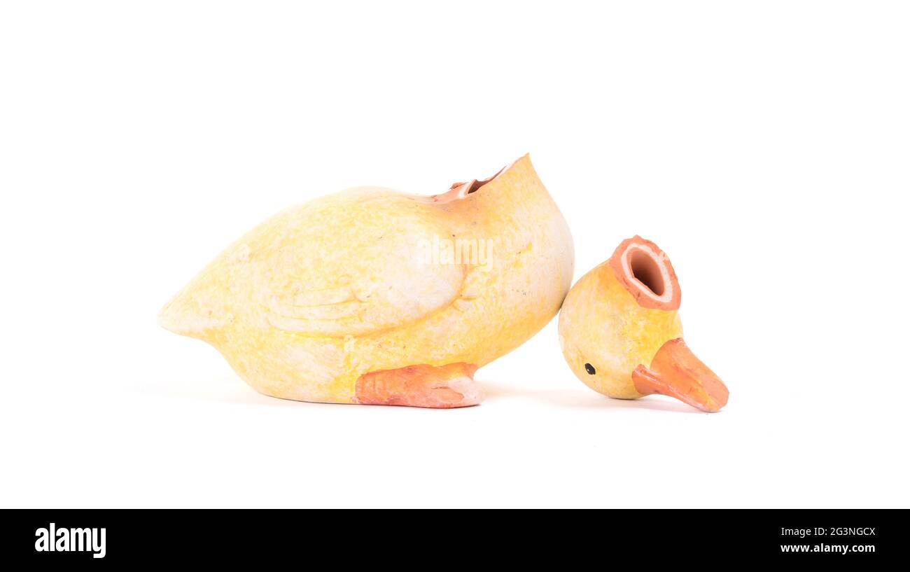 Broken statue of a duckling Stock Photo - Alamy