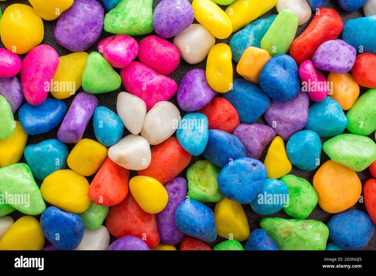 Pile of colorful pebbles as a stone background Stock Photo - Alamy
