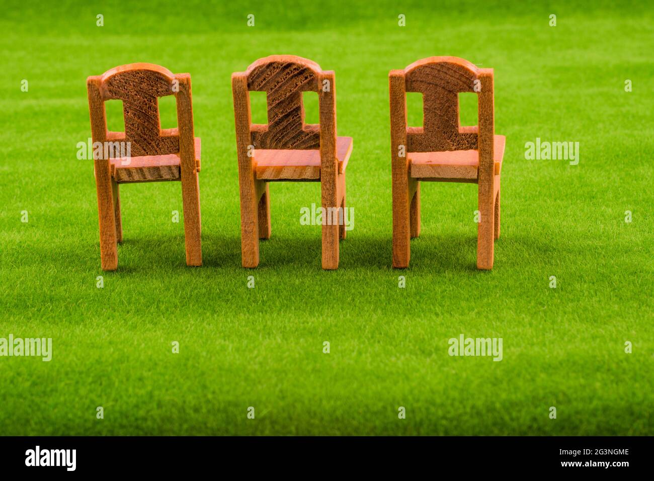 Little model wooden chairs Stock Photo - Alamy