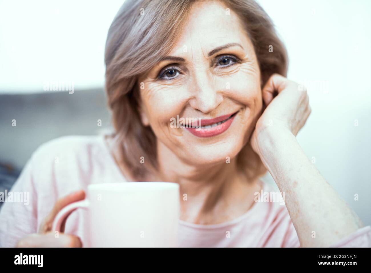 Middle aged senior home sitting hi-res stock photography and images - Alamy