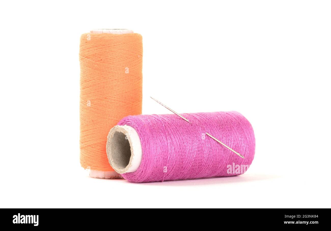 Two sewing thread Stock Photo - Alamy