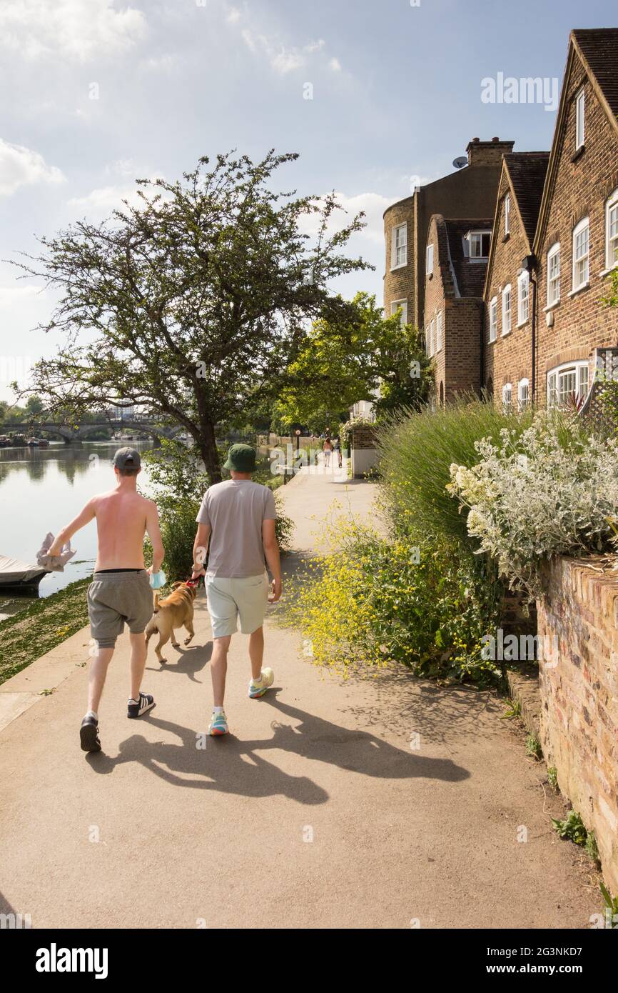 Two men walking hi-res stock photography and images - Alamy