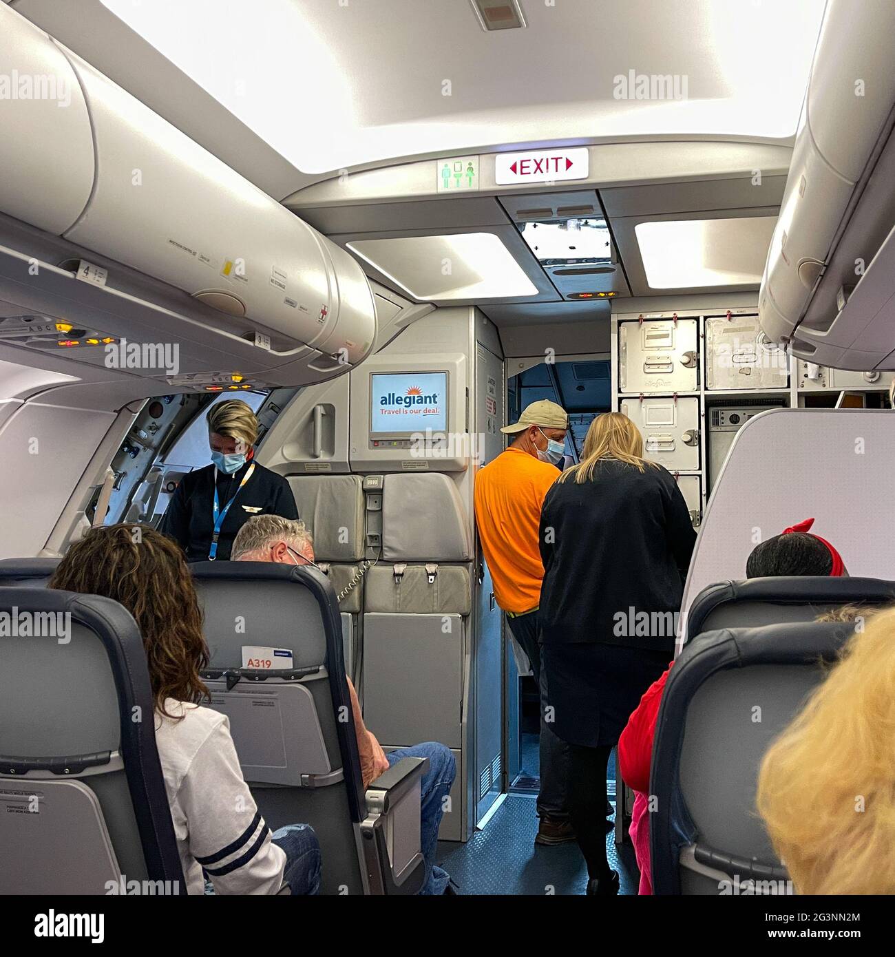 Sanford, FL USA - May 13, 2021: People waiting in an Allegiant airplane ...