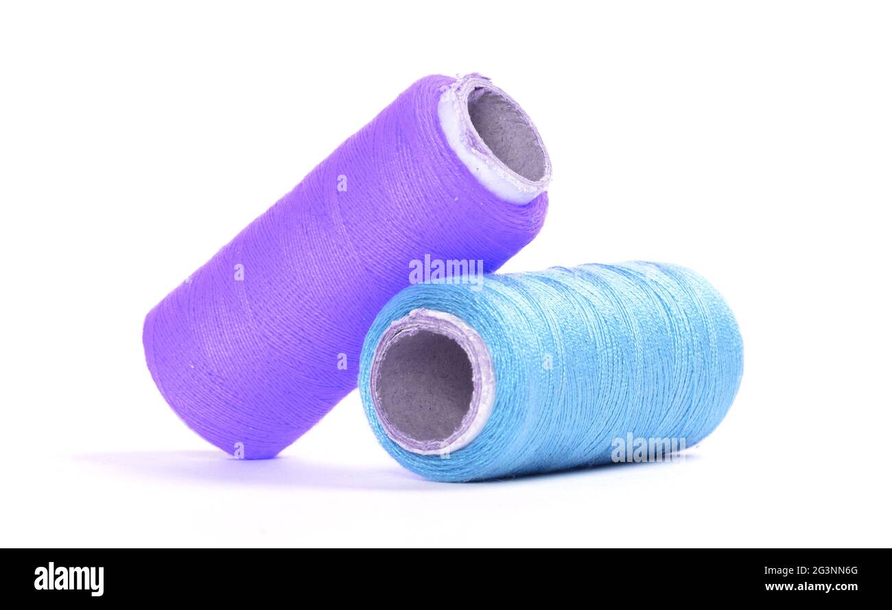 Two sewing thread Stock Photo - Alamy