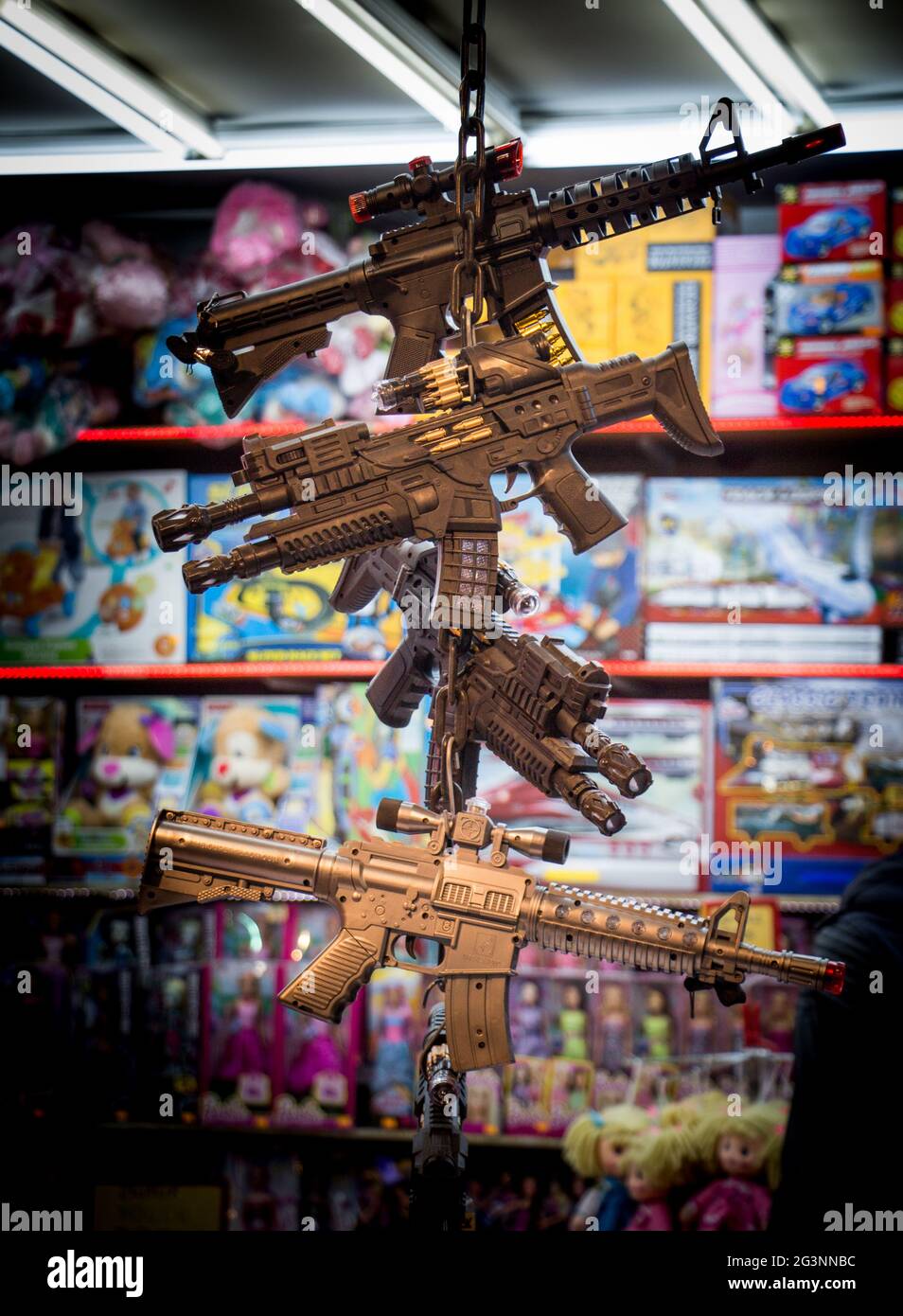 Plastic toy rifles on sale in toy shop Stock Photo - Alamy