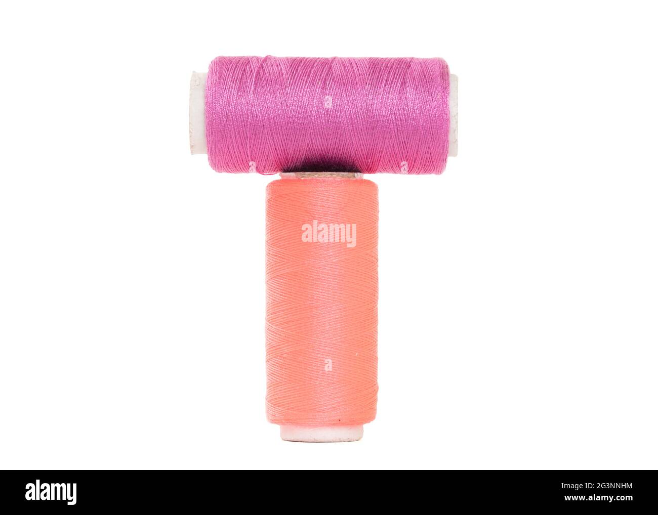 Two sewing thread Stock Photo - Alamy