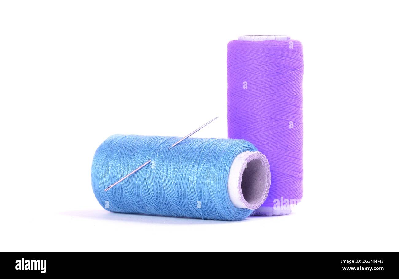 Two sewing thread Stock Photo - Alamy