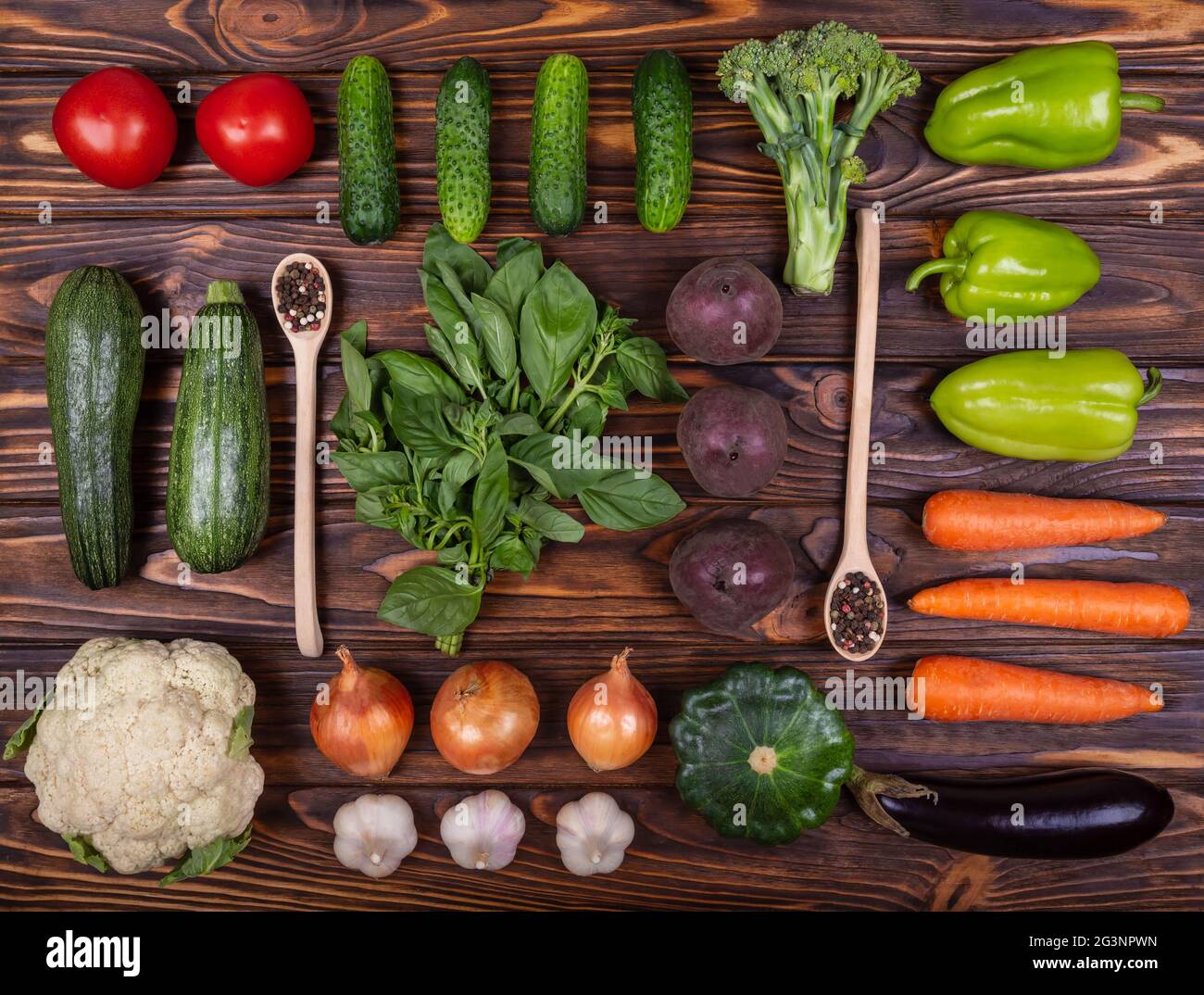 Different fresh farm vegetables laid out. Various colourful vegetables ...
