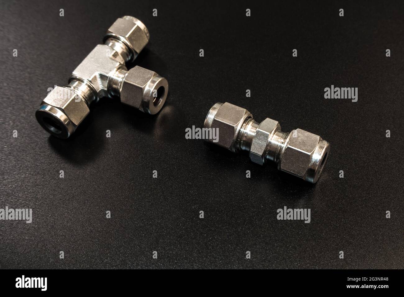 The Stainless steel joint fitting of the pneumatic system on black ...
