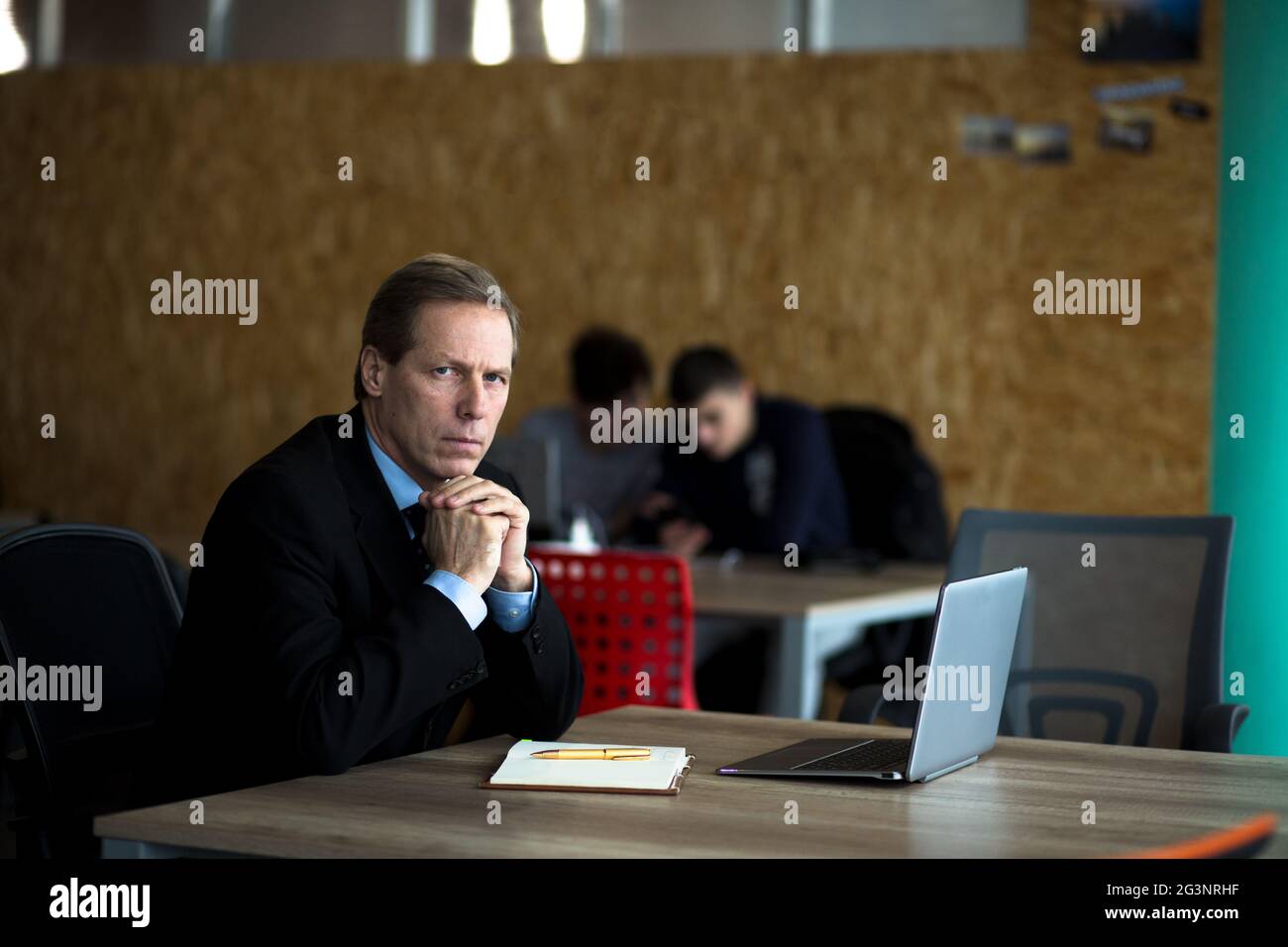 Serious male professional working laptop hi-res stock photography and ...