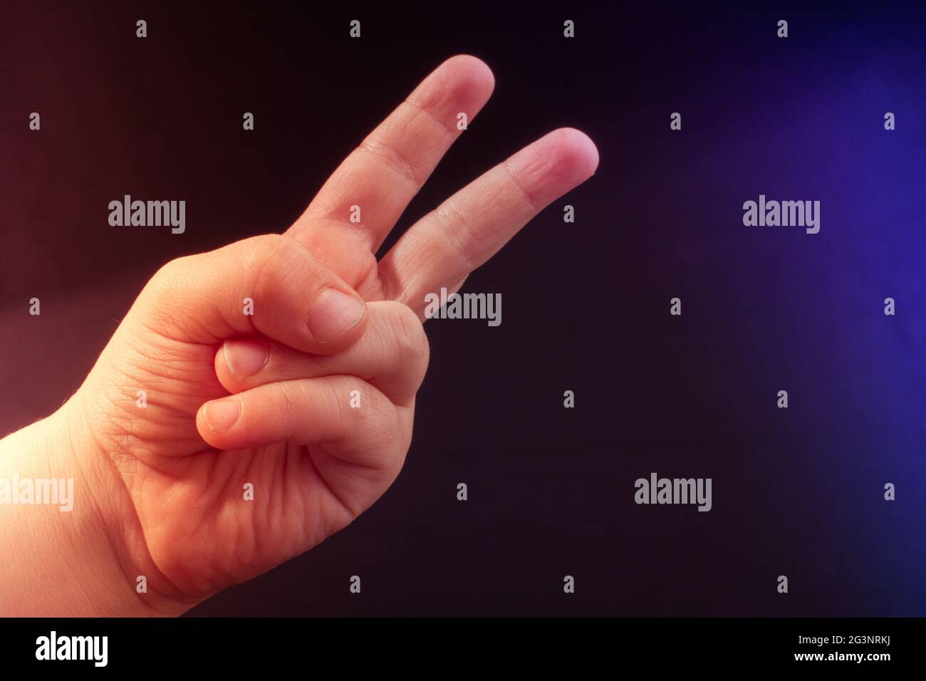 Hand showing peace sign hi-res stock photography and images - Alamy