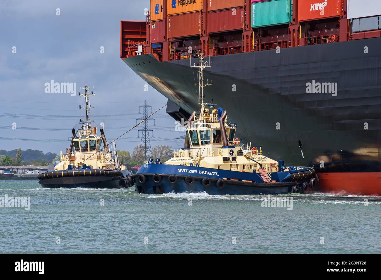 The Svitzer Towage tugs Bargate and Eston assist with the berthing of ...