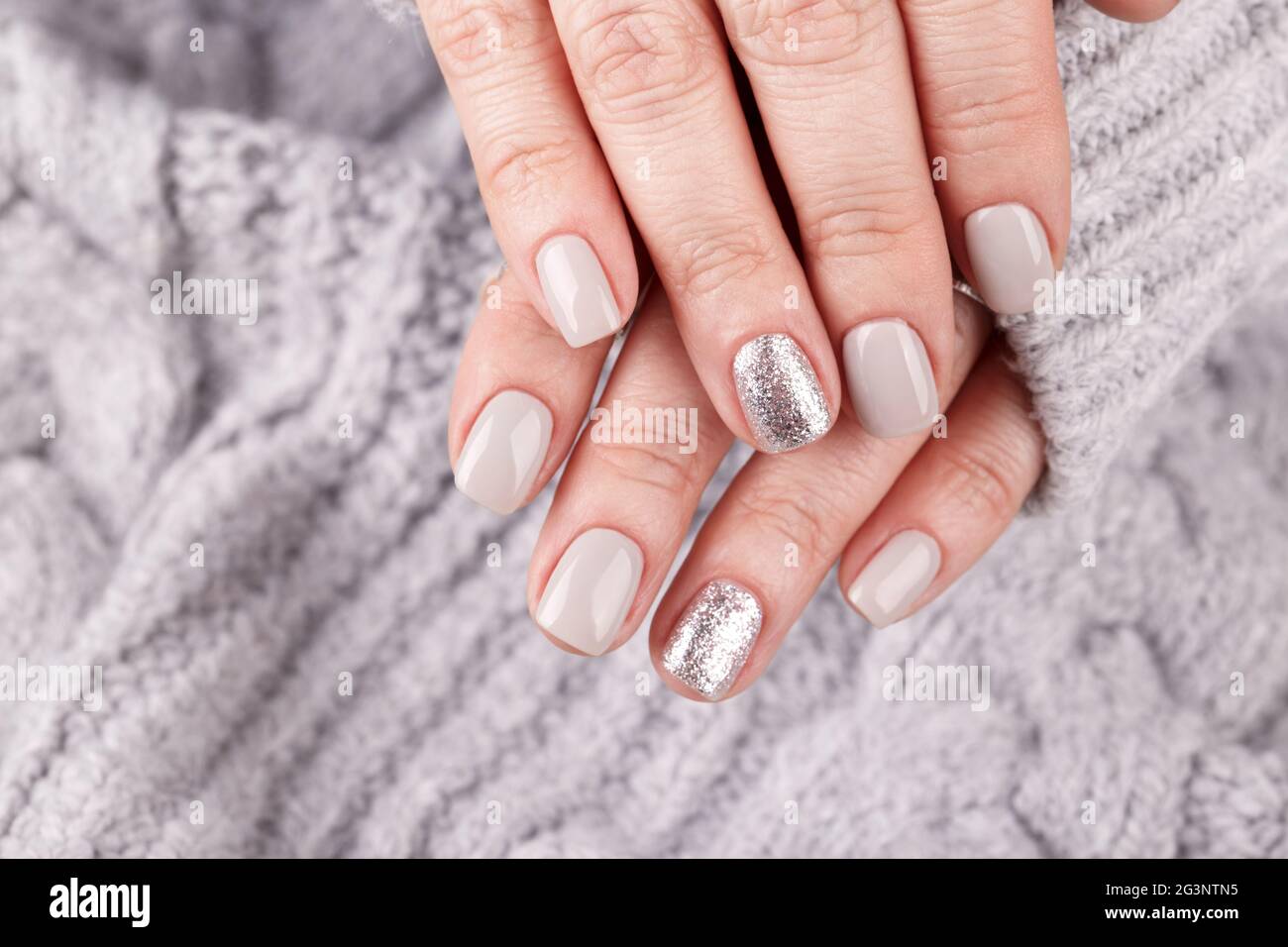 Manicured woman hands Stock Photo - Alamy
