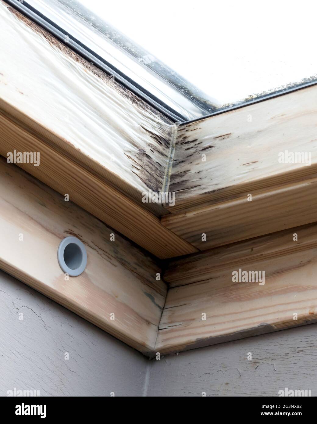 Roof window after leaking Stock Photo - Alamy