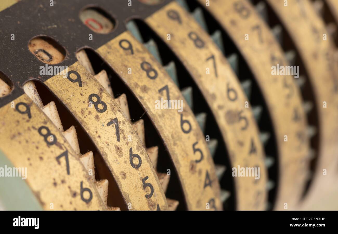 Vintage manual adding machine isolated, yellow Stock Photo - Alamy