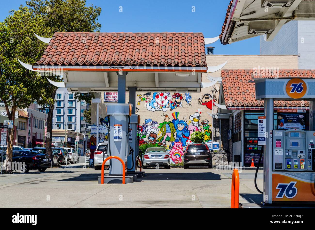 A colorful mural at a gas station in Oakland California's Chinatown USA ...