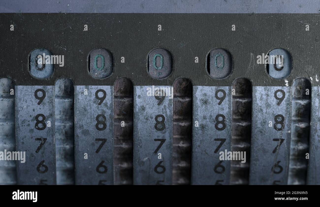 Vintage manual adding machine isolated, blue Stock Photo - Alamy