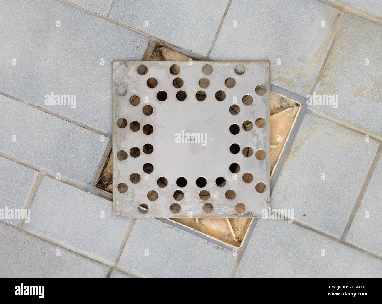 Floor drain in an old shower Stock Photo - Alamy
