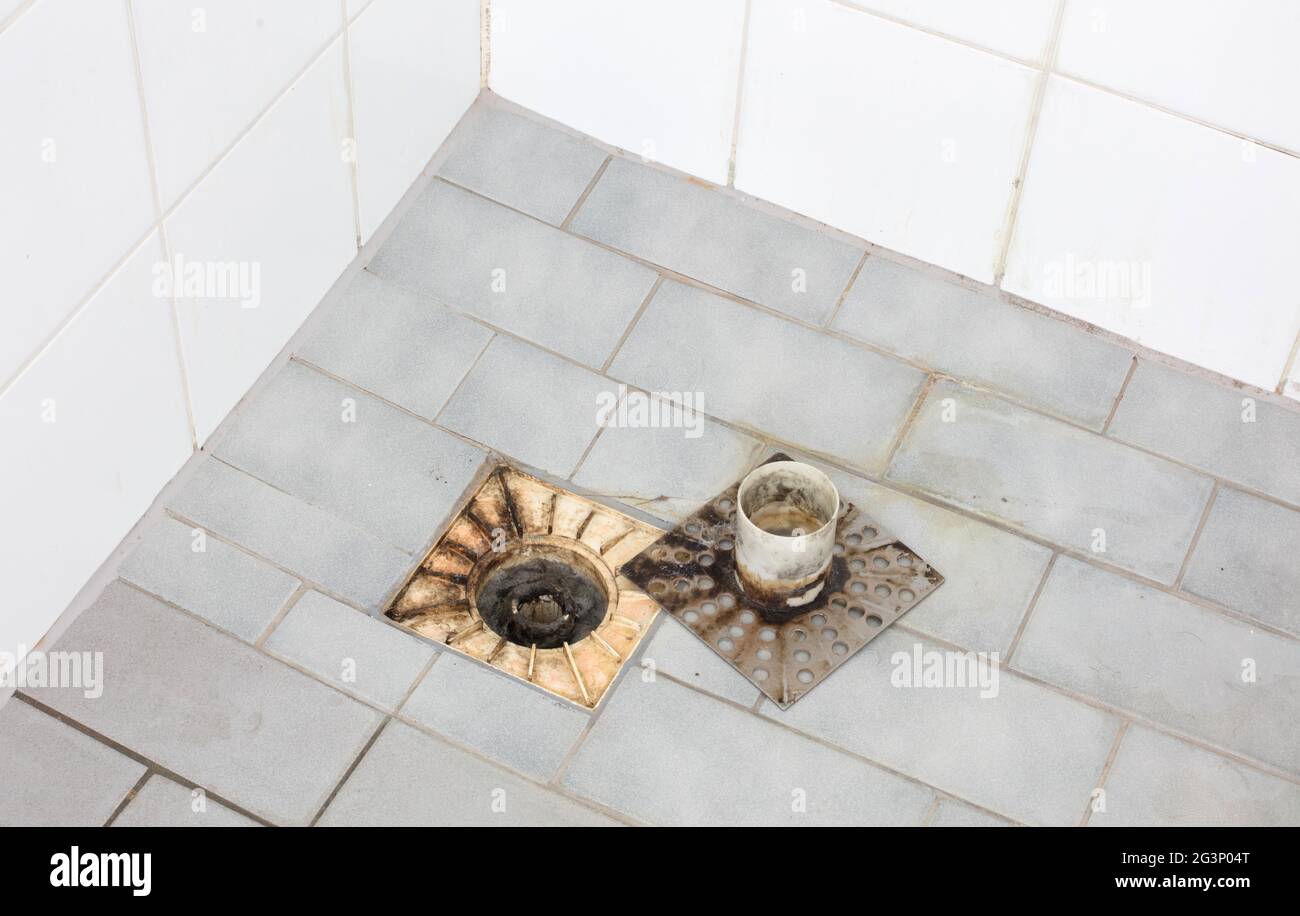 Floor drain in an old shower Stock Photo - Alamy
