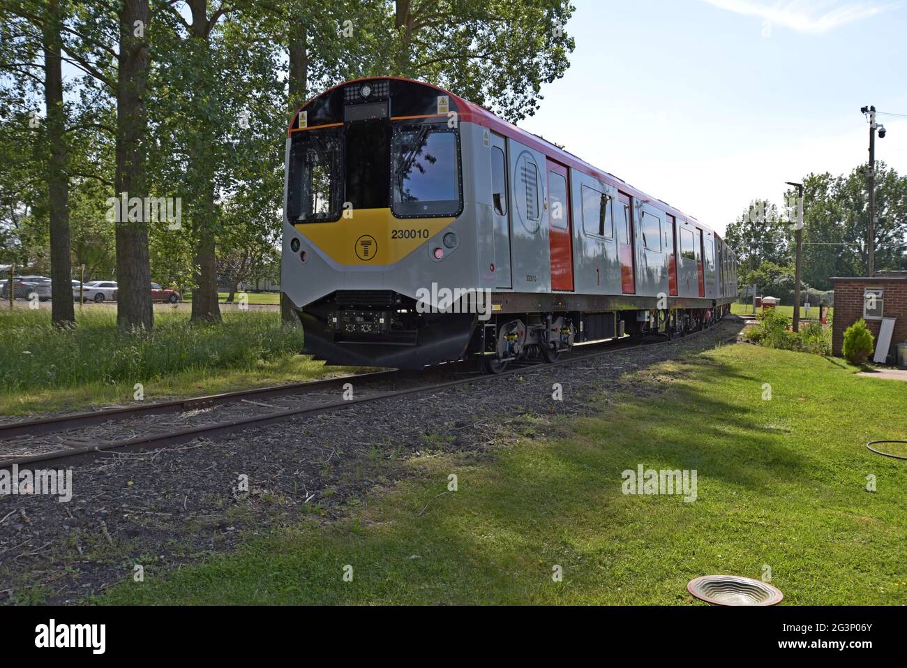 A Viva Rail 230 Class DMU in Transport For Wales livery. The unit is ...