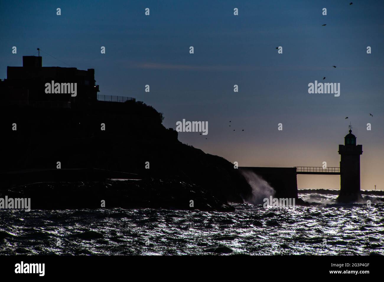 Wave on the port of Marseille Stock Photo - Alamy