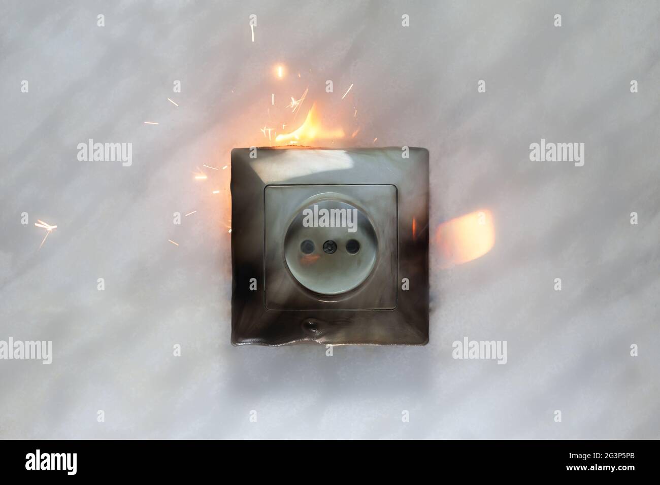 Short circuit of electrical wires sparks molten wires, fire from ...