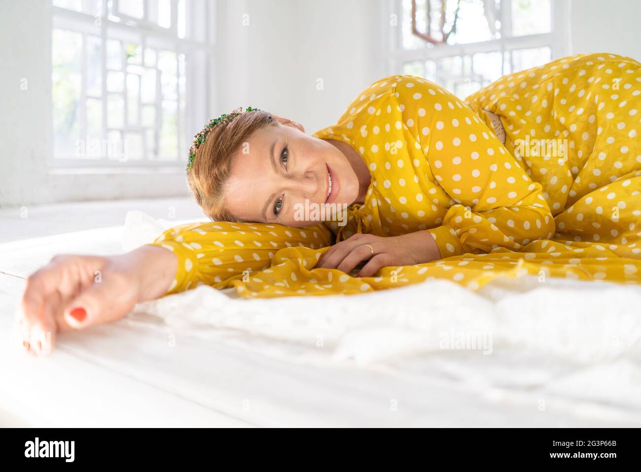 Woman lying down dress hi-res stock photography and images - Alamy
