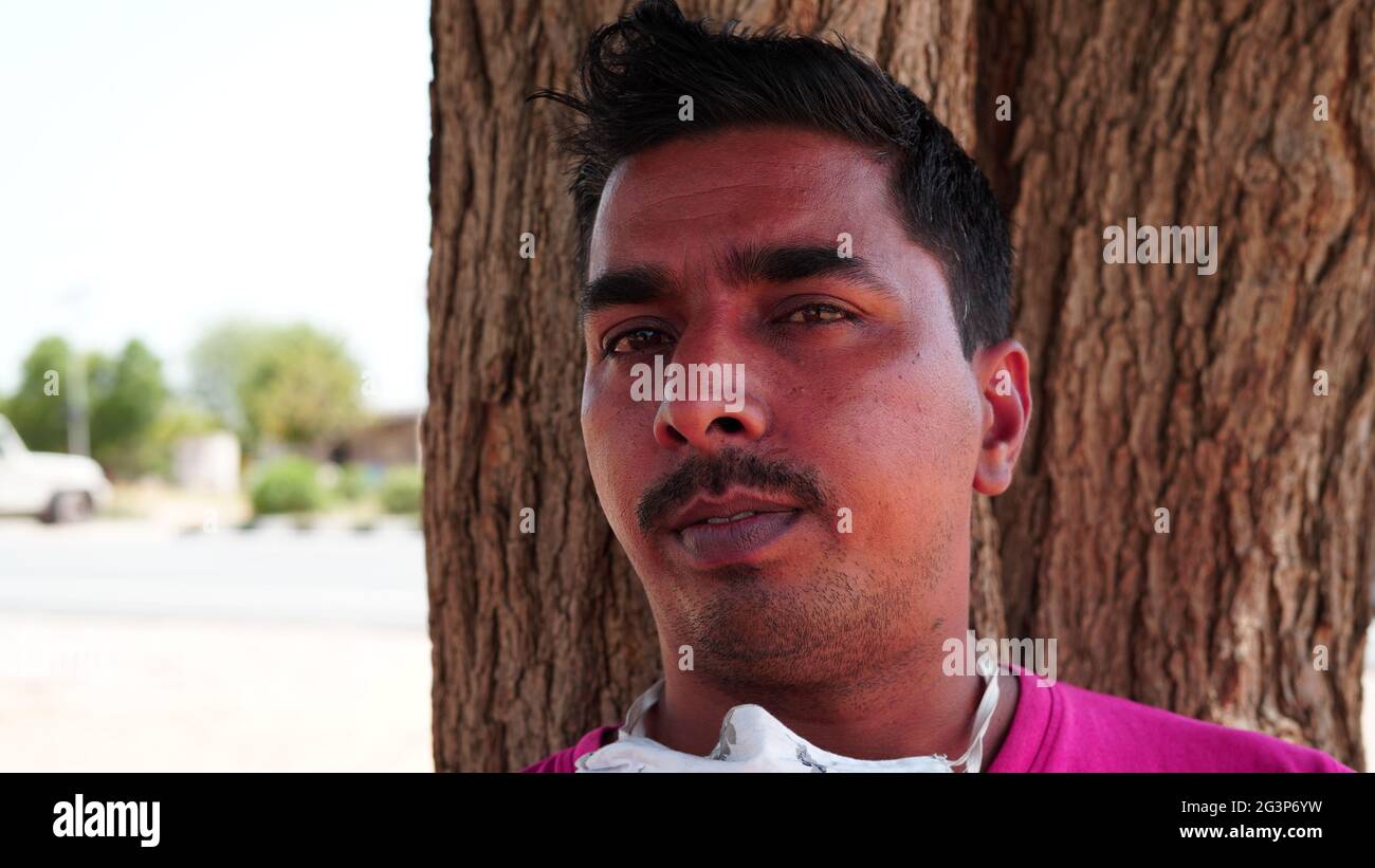 Indian man serious hi-res stock photography and images - Alamy