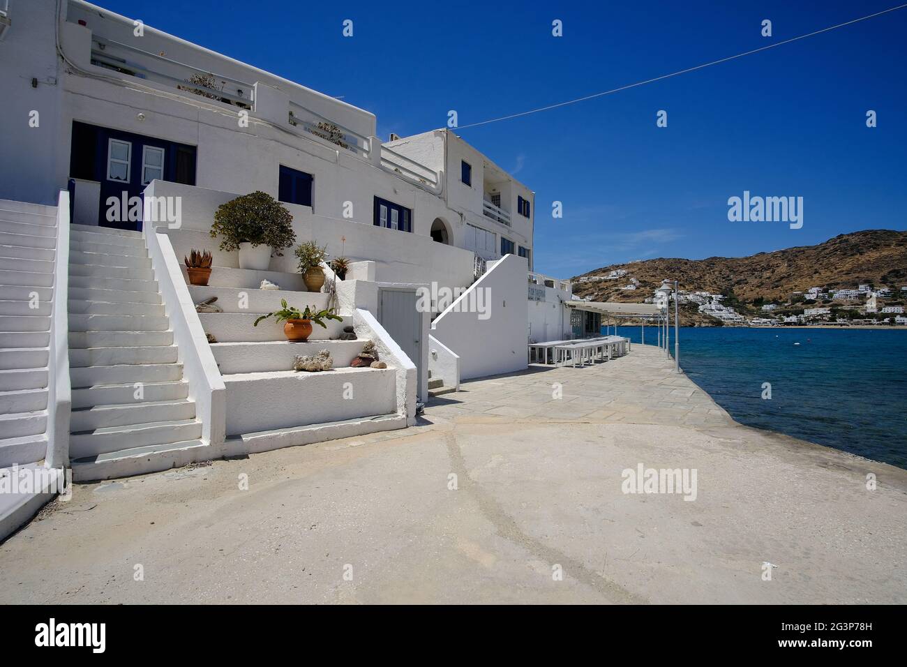 Ios, Greece - May 16, 2021 : A whitewashed hotel that rents rooms, with ...