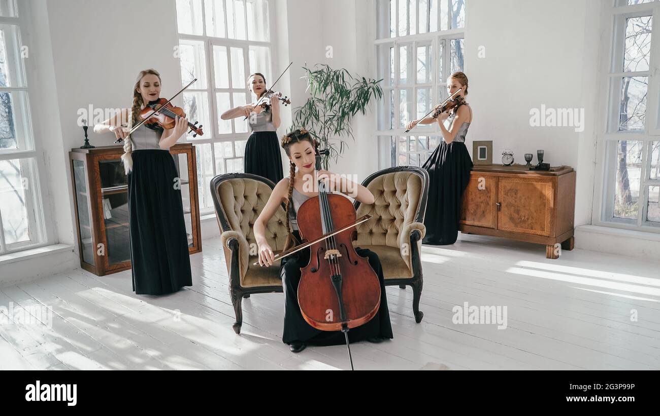 Musical Quartet And Its Perfomance Stock Photo - Alamy