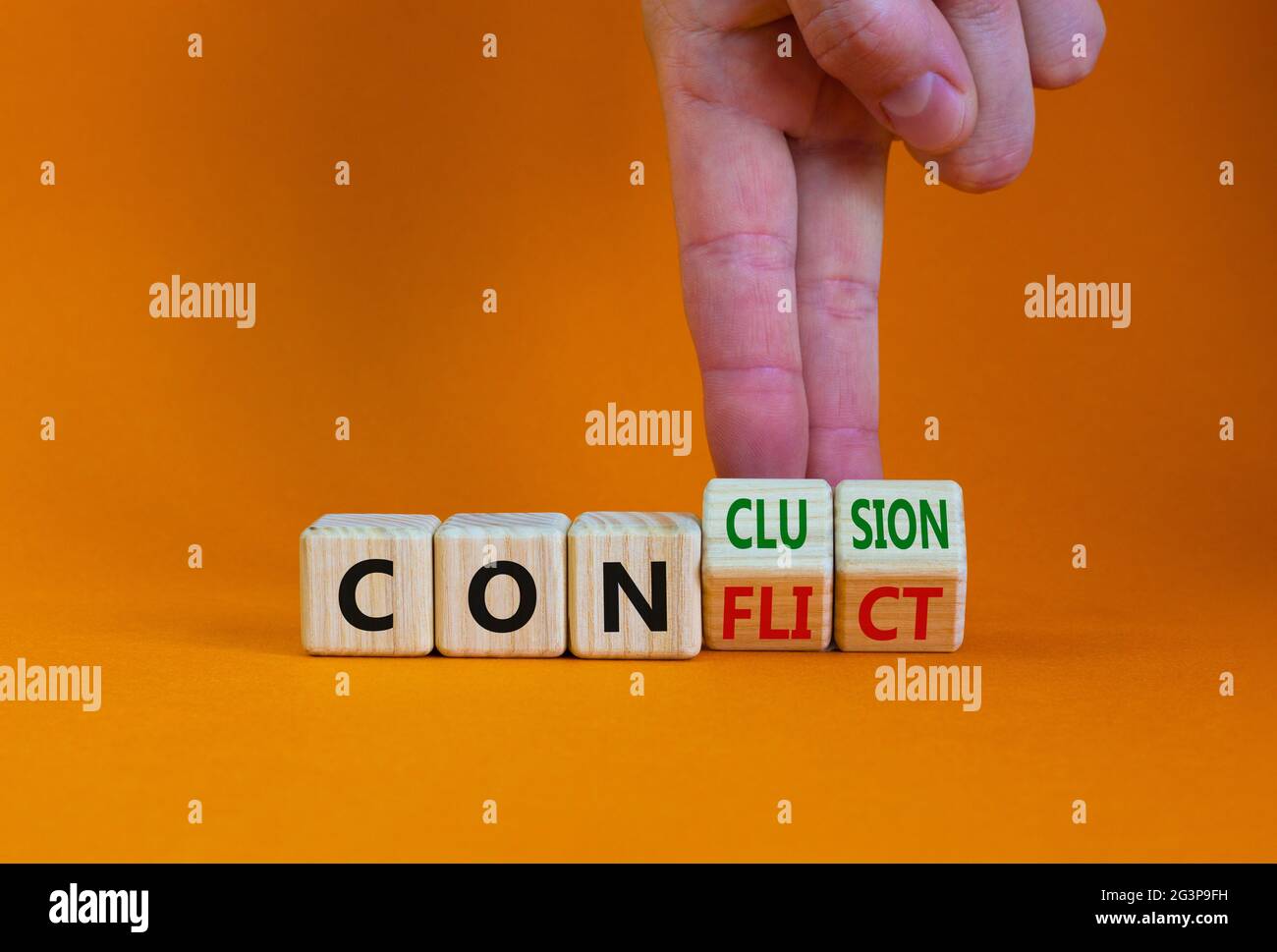 Conflict or conclusion symbol. Businessman turns wooden cubes, changes ...