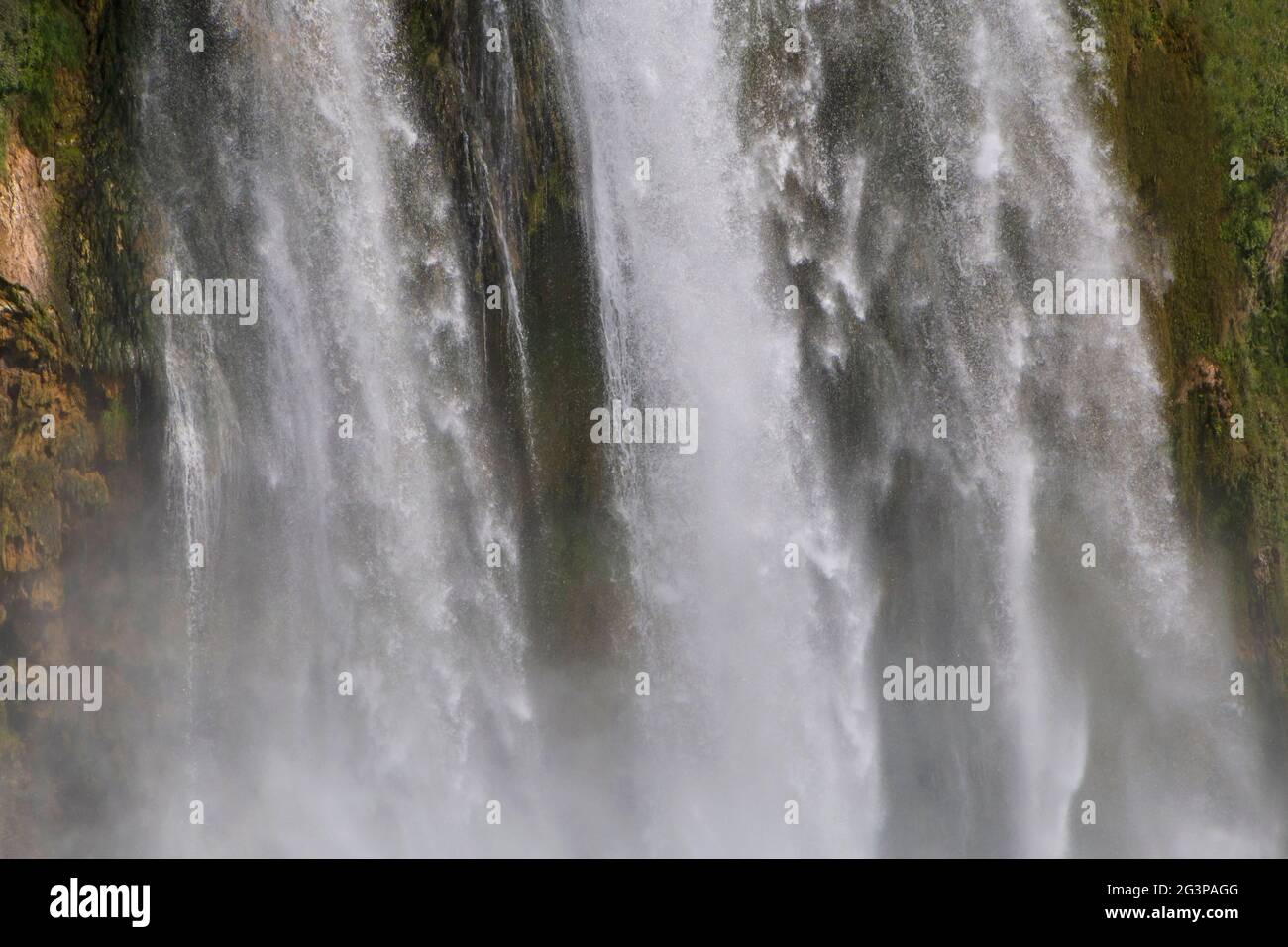 view on several waterfalls falling from rock Stock Photo - Alamy