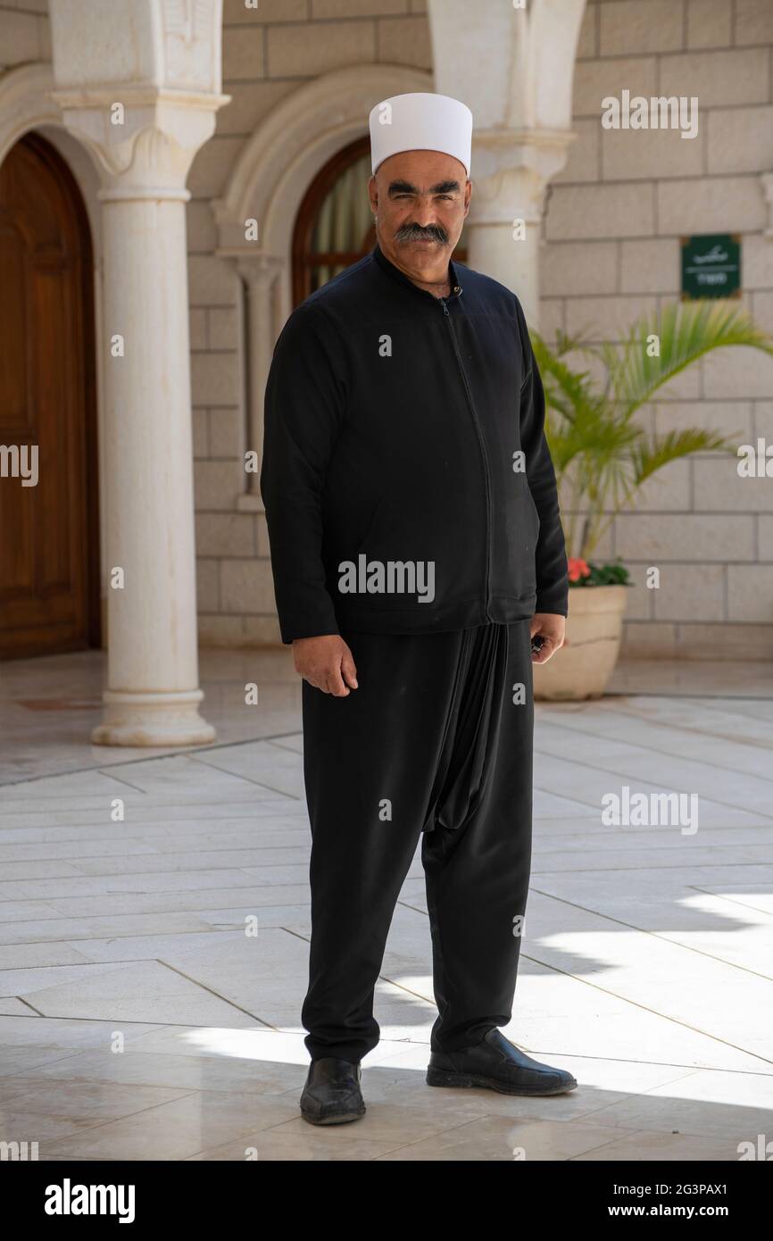 A friendly Druze man posing for a picture inside the complex of famous ...
