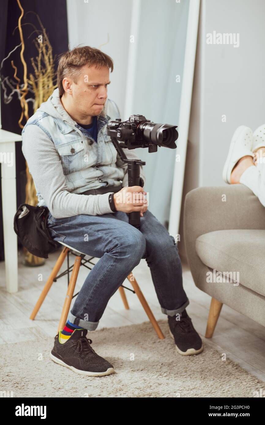 Creative Paparazzi Takes Pictures With Digital Camera Stock Photo - Alamy