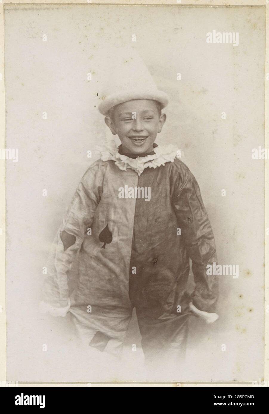 Portrait of a French boy dressed as a pierrot. Part of photo album from ...