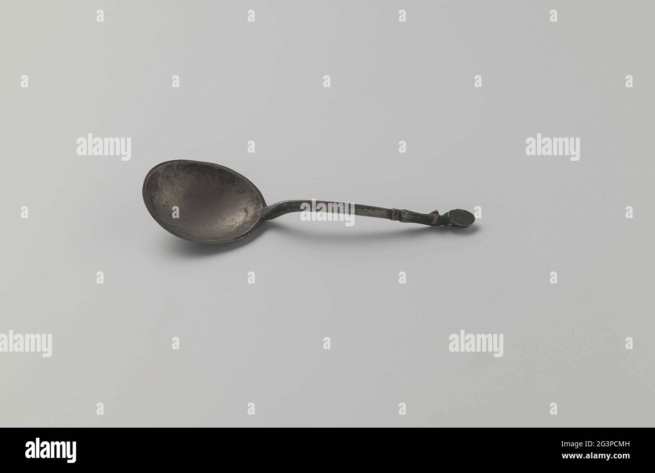 Pewter spoon with a studded hoof. Pewter spoon with angular stem. The ...