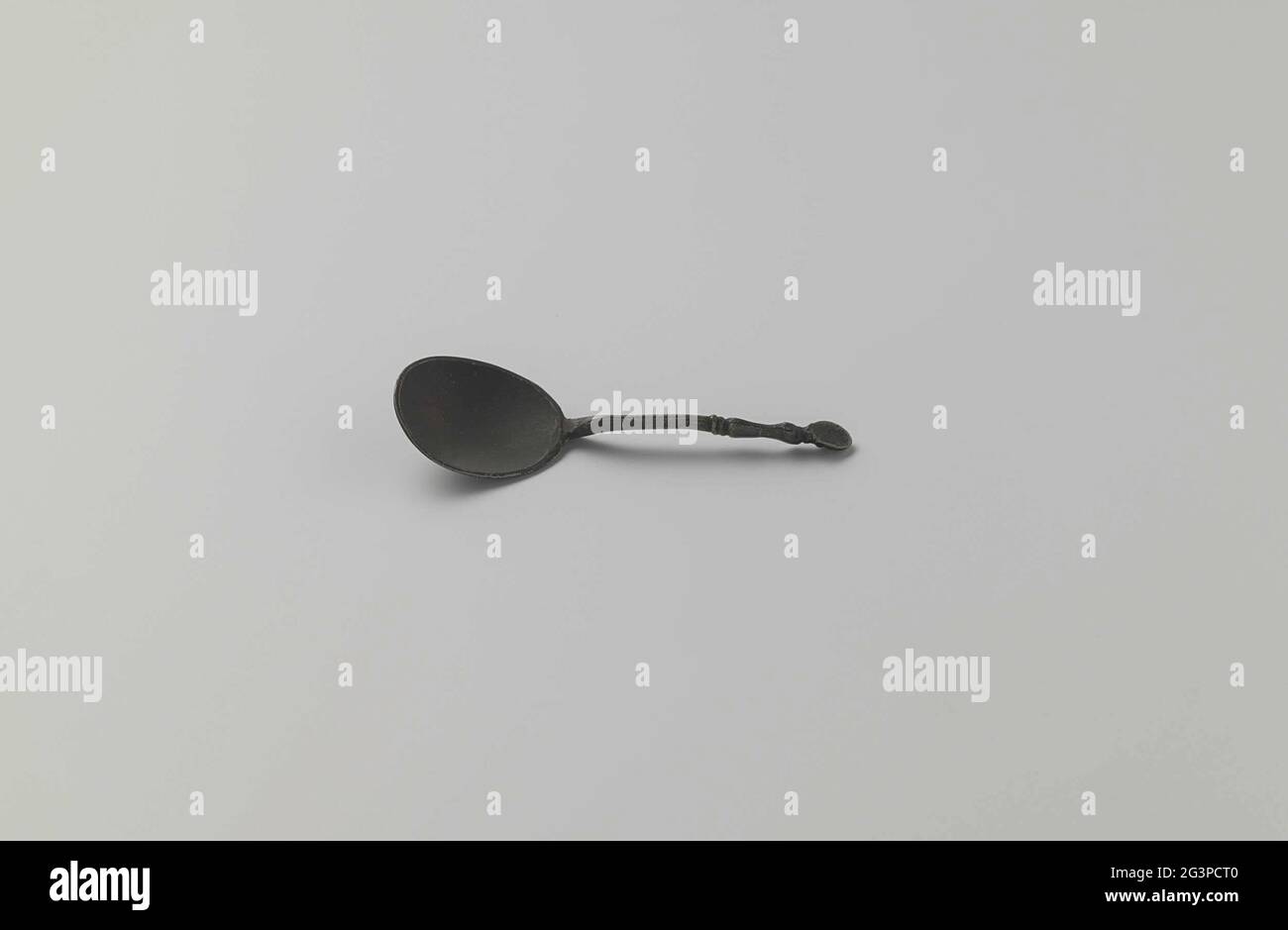 Pewter spoon with a hoof. Pewter spoon with angular stem. The handle ...