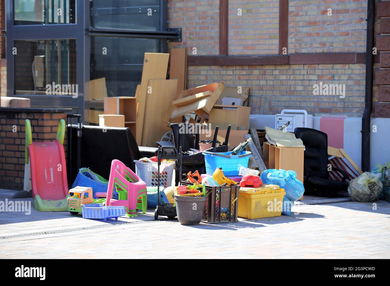 Bulky waste ready for collection on the street Stock Photo - Alamy