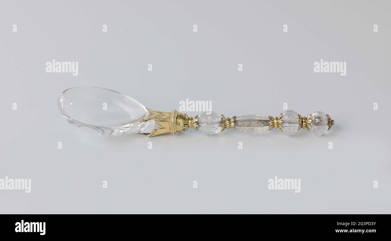 Spoon of ground rock crystal with gold-plated silver. Spoon of a table ...