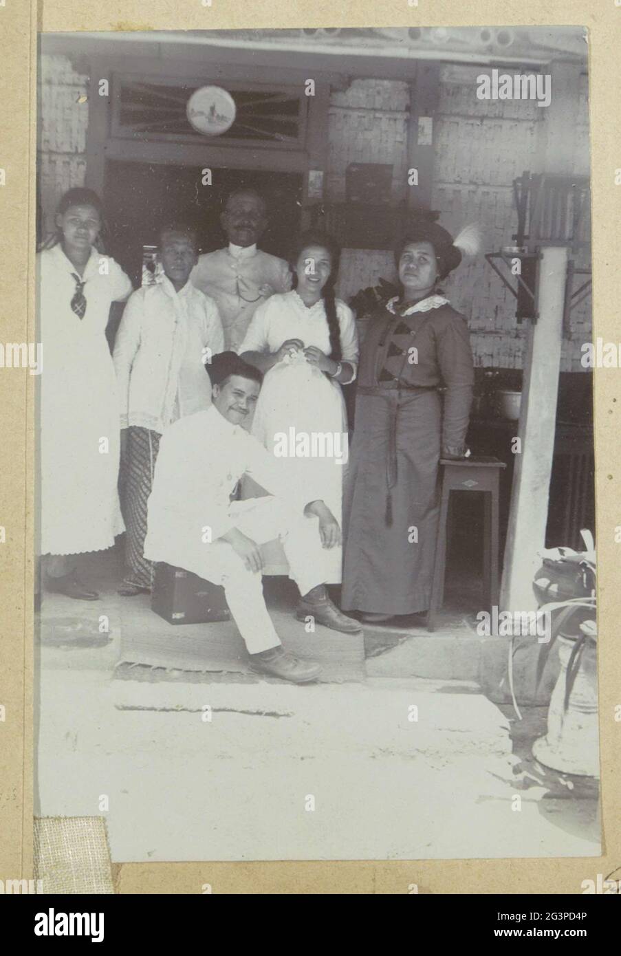 Group portrait of the Van Ede family on a veranda, presumably in ...