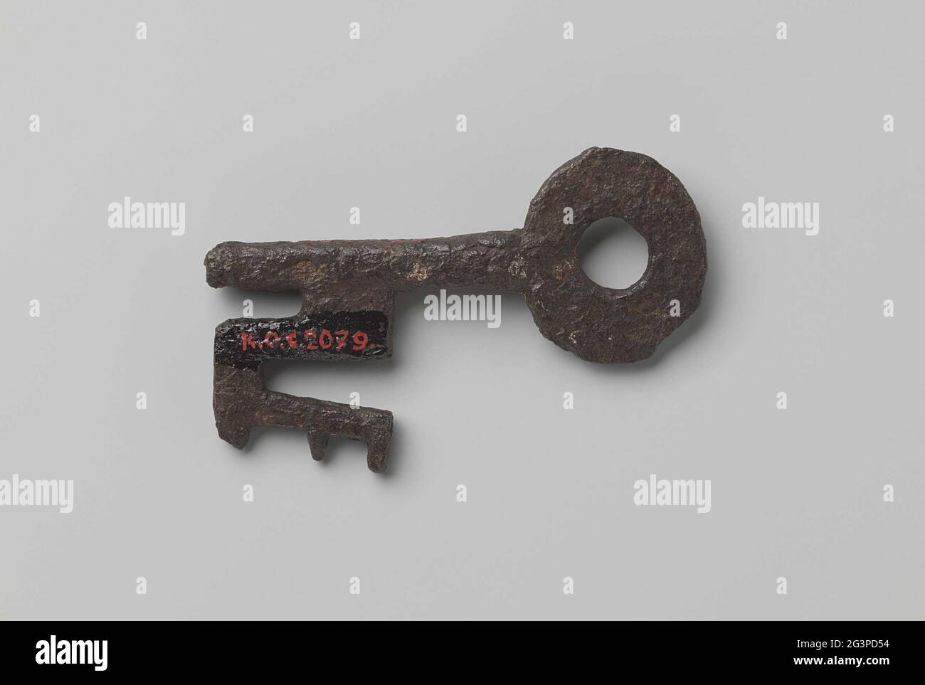 Key. Key with flat round, pierced handle and short shaft Stock Photo ...