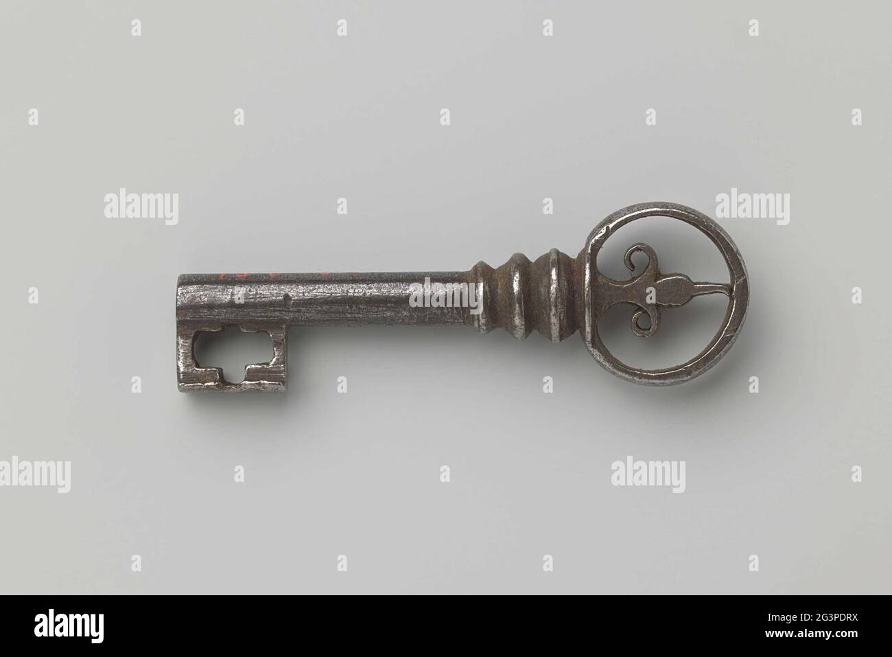 Pipe key. Pipe key with lily in the round eye. The capital consists of ...